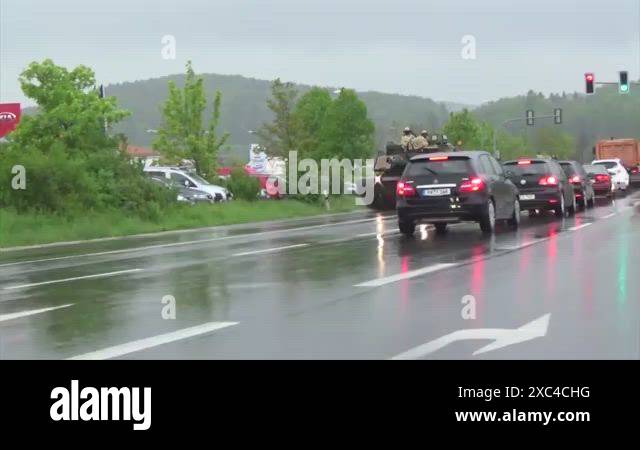 Military grade tanks are delivered by road to a base in Germany Stock ...