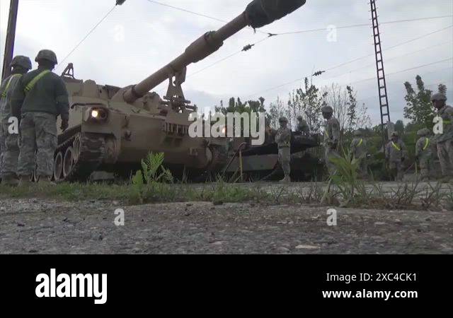 Military grade tanks are delivered by road to a base in Germany Stock ...