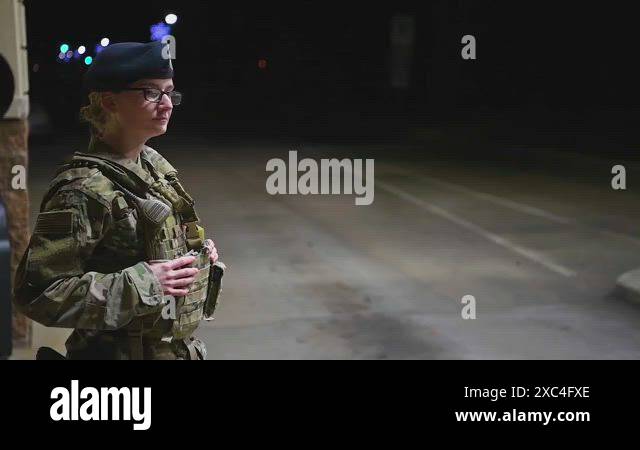 2019 - a female soldier guard mans a checkpoint at the entry gate of a ...