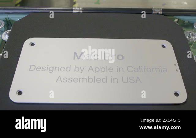 2019 - U.S. President Donald Trump and Apple President Tim Cook tour an ...