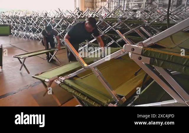 2021 - U.S. army personnel set up cots and beds at an Afghanistan ...