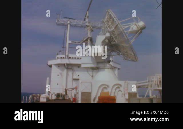 1966 - Views of large radar antennas mounted on the deck of the USNS ...