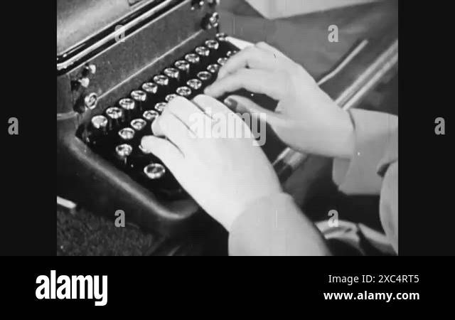 1943 - A woman demonstrates differing ways to type on different kinds ...