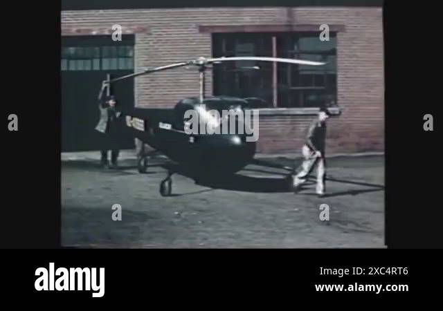 1944 - The controls in a Bell helicopter are shown and explained before ...