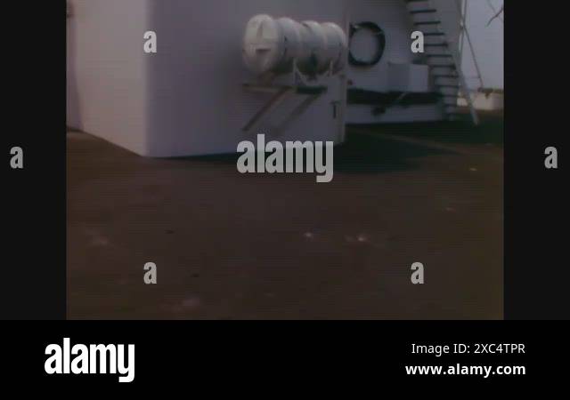 1966 - Images of a life ring, a man on a desk speaking into a lip mike ...