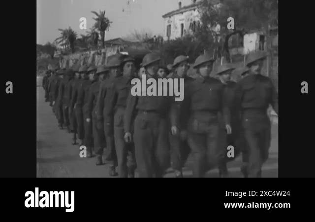 1944 - A chaplain in the Canadian Army conducts a service for fallen ...