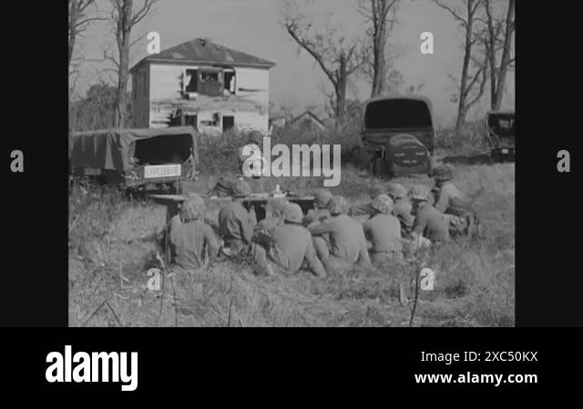 1951 - Troops in the field watch as captain demonstrates demolition ... 1951 - Troops in the field watch as captain demonstrates demolition ...