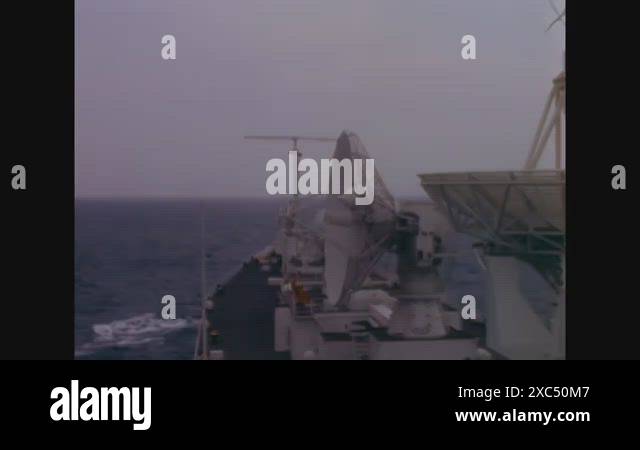 1966 - Ship is sailing into open sea with view of radar antennas on the ...