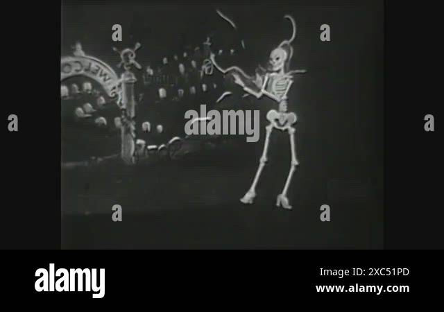 1942 - A skeleton marionette is made to dance to jazz music in front of ...