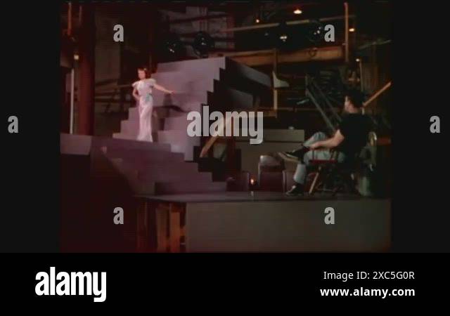 1937 - In this drama film, a young actress is given lessons in posture ...