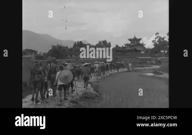 1945 - French colonial troops and natives, including children, walk ...
