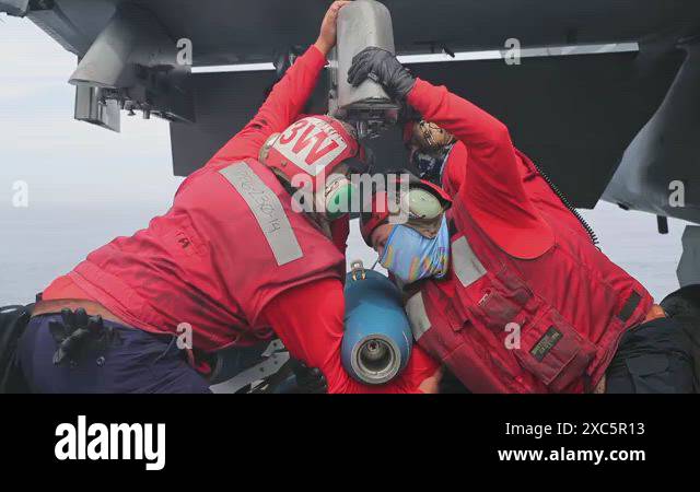2020 Sailors on the USS Gerald R Ford load MK-82 500 lb inert bombs and ...