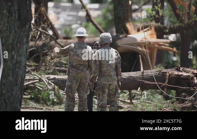 2020 U.S. Marines clear debris and rescue a dog during the recovery ...