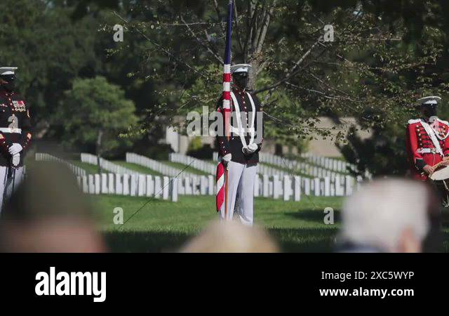 2020 Slow motion U.S. Marines in dress uniform lay a fallen soldier to ...