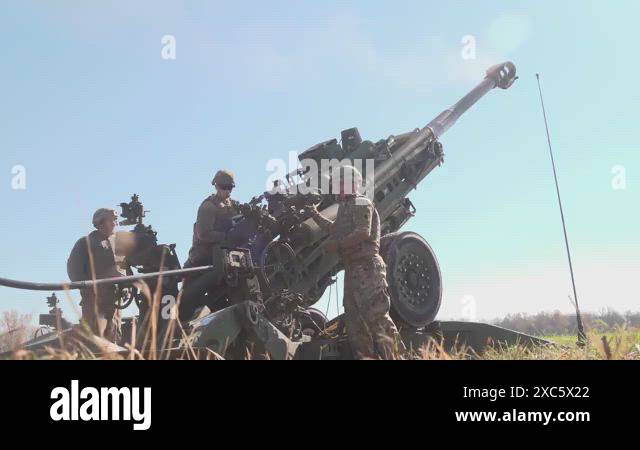 2020 U.S. Army soldiers load and fire a M-777 Howitzer Cannon during ...