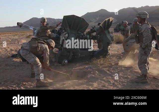 2021 U.S. Marine artillery battery fire M777 towed 155mm howitzer live fire defensive combat ...