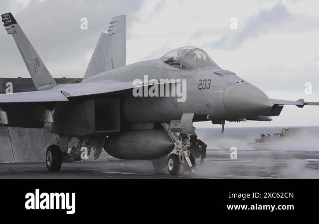 2021 U.S. Navy sailors conduct jet fighter plane operations on the ...