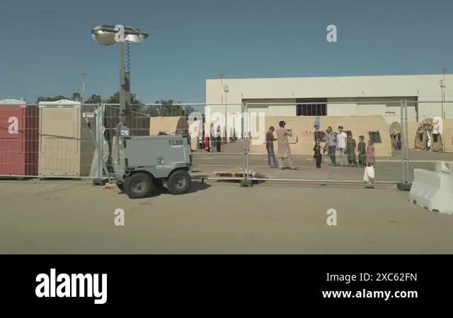 Temporary housing pods for Afgan refugees on the flight line, Operation ...