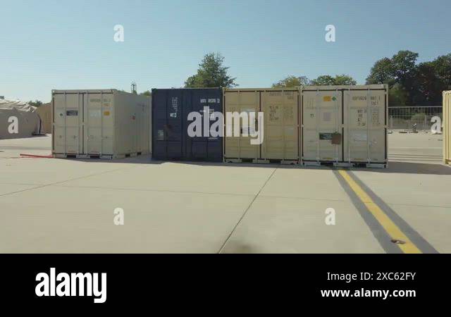 Temporary housing pods for Afgan refugees on the flight line, Operation ...
