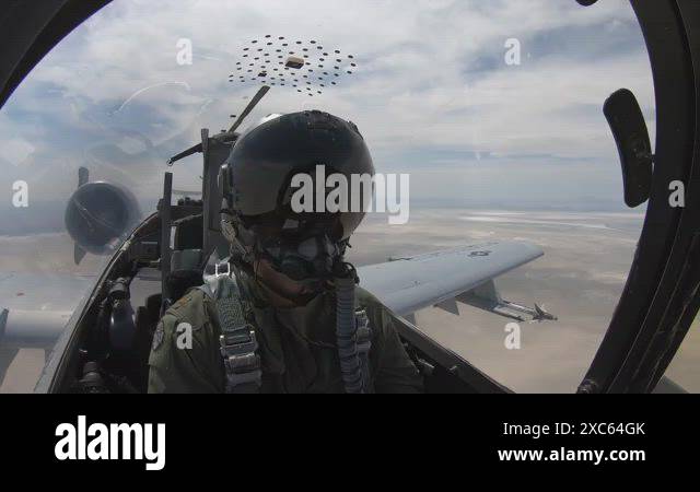 2021 Cockpit view of a U.S. Air National Guard pilot firing an AIM-9 ...