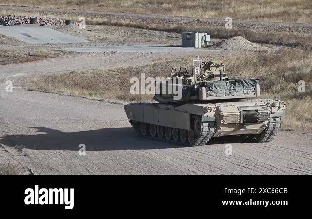 2021 U.S. Army soldiers fire the main gun of an M1A2 Abrams Tank during ...
