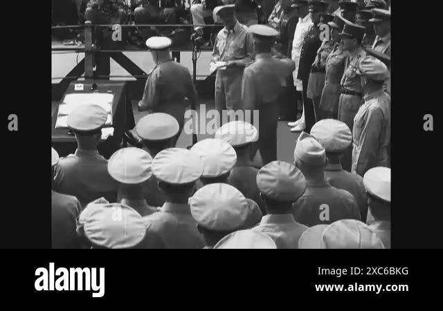 JAPAN - 1945 - Allied officers sign Japan's surrender document aboard ...