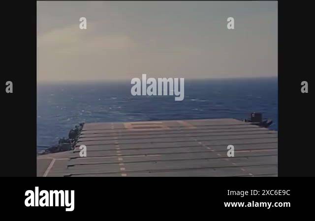 1954 - View from the deck of the USS Hancock showing a plane flying ...