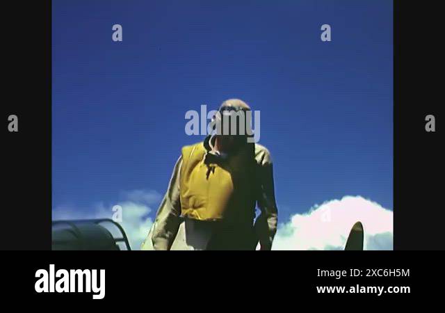 1957 - Closeups of US pilots sitting in cockpits of their planes and ...