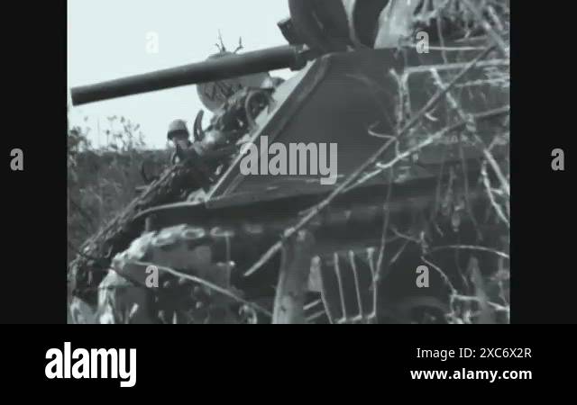 1945 - Marines and tanks during the Battle of Peleliu in WW2 fire ...