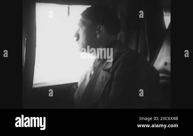 1932 - Inside a plane Adolf Hitler looks through the window on his way ...