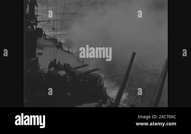 1944 - United States military personnel shoot cannons off their ...