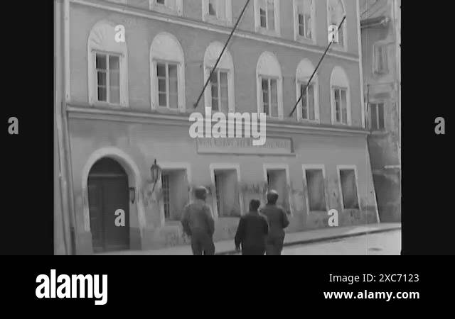 1945 - Exteriors and interior displays of Hitler's birthplace, which is ...