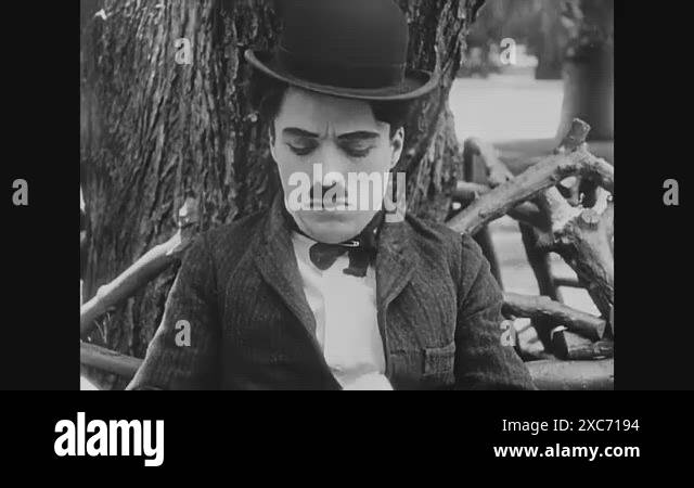 1914 - In this silent comedy, the little tramp (Charlie Chaplin) tears ...