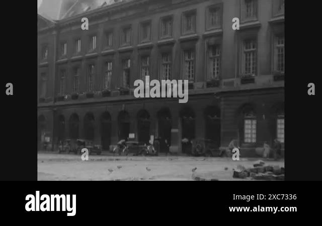 1944 - Civilians in Metz, France replace German streets signs on ...
