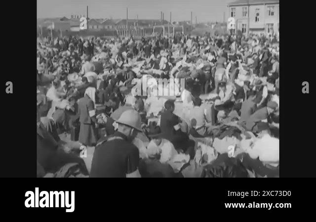 1945 - Crowds of Japanese people leaving China are waiting with their ...