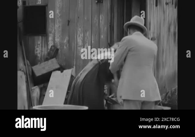USA - 1926 - In this silent movie, a man helps a washer woman he likes ...