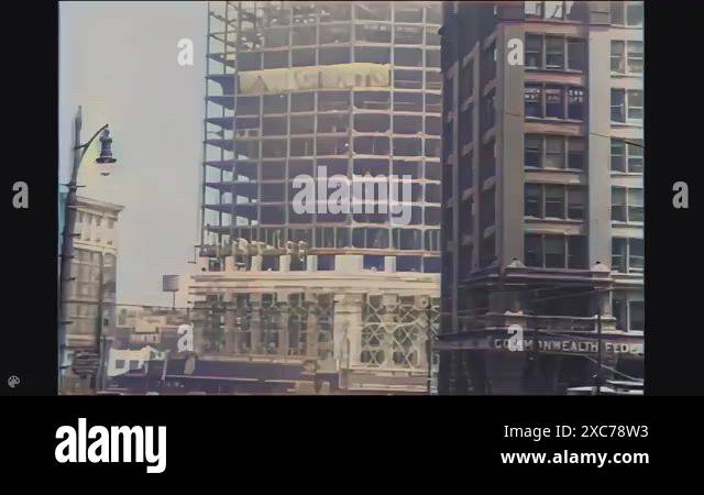 DETROIT - 1921 - Motorists drive through a neighborhood in Detroit ...