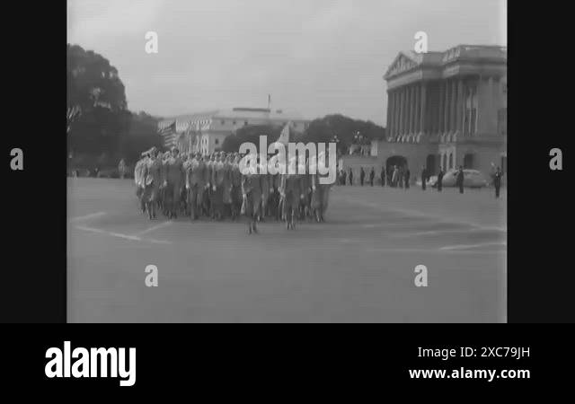 1950 - WACs and African-American troops march in a military parade past ...