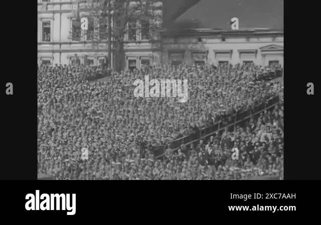 BERLIN - 1939 - Huge crowds including Nazi officers watch army tanks ...