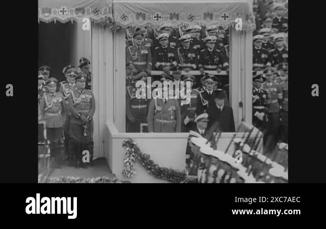 BERLIN - 1939 - Adolf Hitler salutes Nazi servicemen as they march past ...