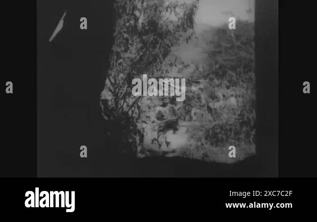 CHINA - 1944 - Chinese soldiers squeeze through a narrow passageway and ...