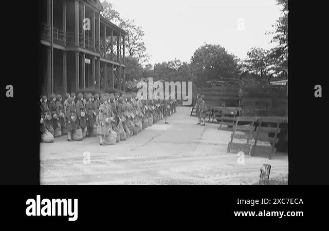 USA - 1943 - WACs board US army trucks with their barracks bags at the ...