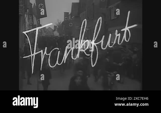 GERMANY - 1938 - Nazi soldiers march through several German cities past ...