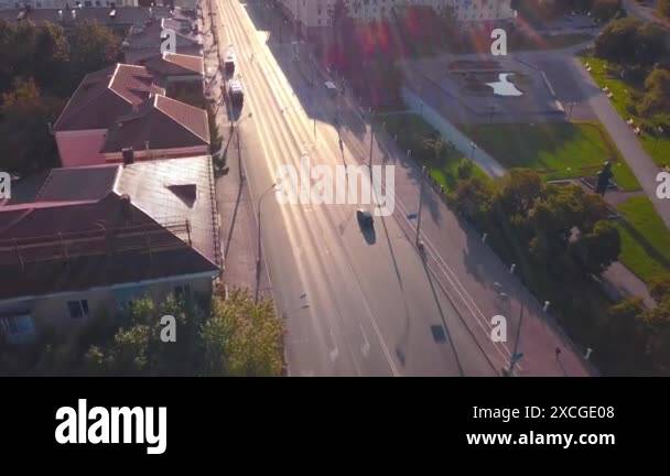 Top view of beautiful city road with car on sunny day. Clip. Urban ...