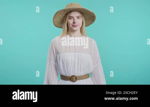 Gorgeous woman in boho dress outfit showing yes signal, nods head ...
