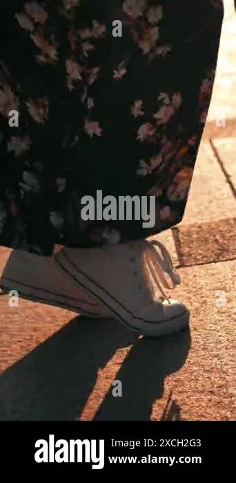 Dancing feet of married couple, dancing at big city street. Some ...