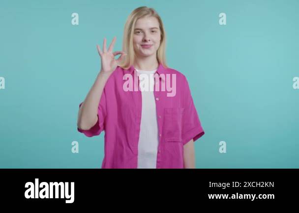 Pretty woman makes hand sign okay, ok gesture. Happy girl, correct ...