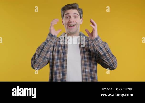 White handsome shocked man glad, he screaming WOW. Impressed guy trying ...