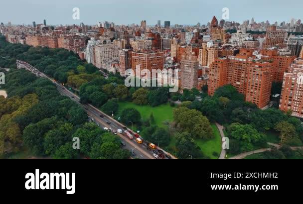 Flying above green area at the waterfront of New York. Beautiful ...