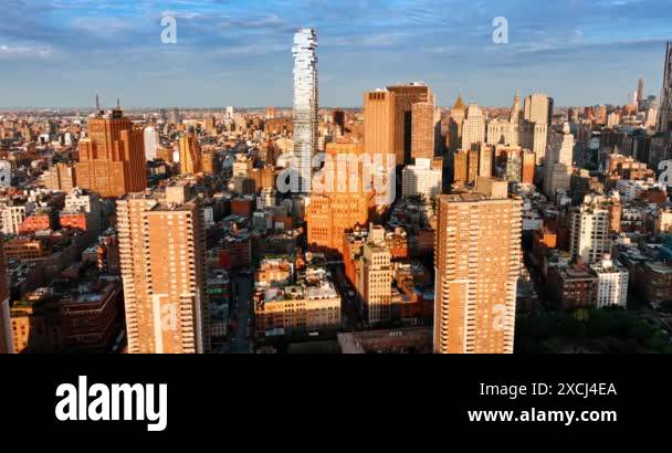Bright sun lighting the diverse dense architecture of New York. Golden ... Bright sun lighting the diverse dense architecture of New York. Golden ...